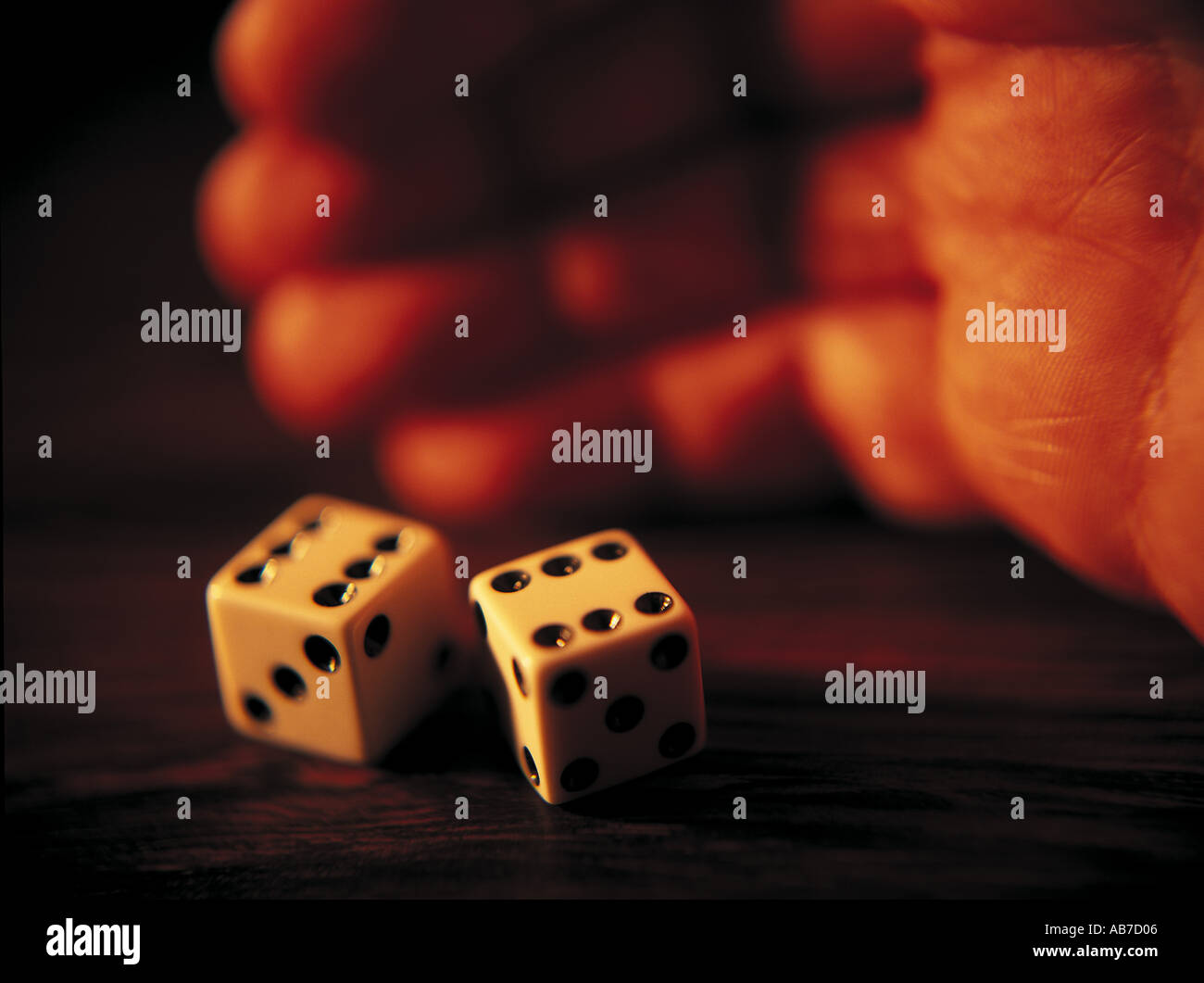 Close up man throwing dice hi-res stock photography and images - Alamy