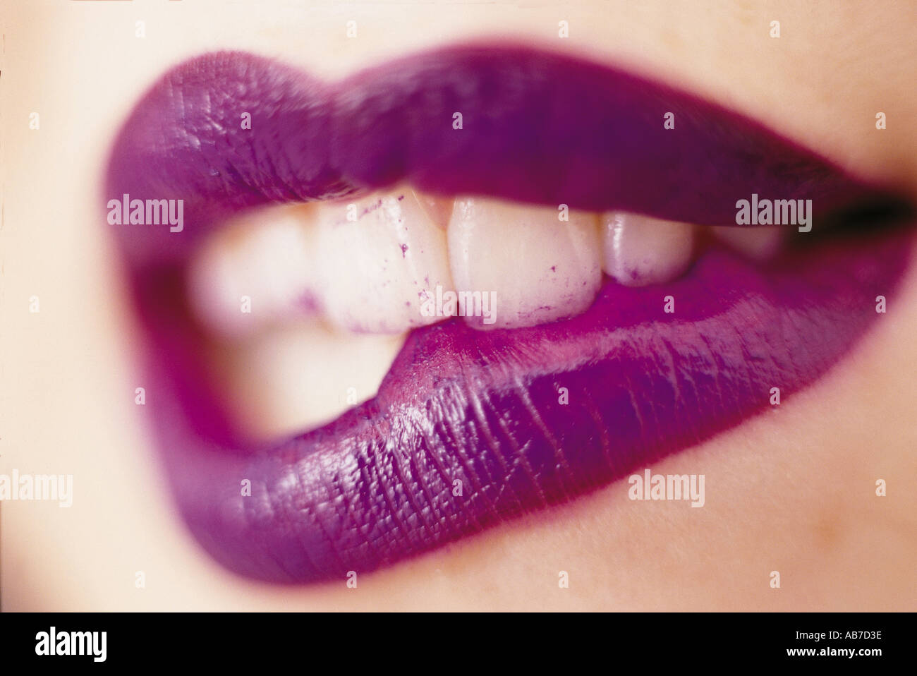 Bitten lips hi-res stock photography and images - Alamy