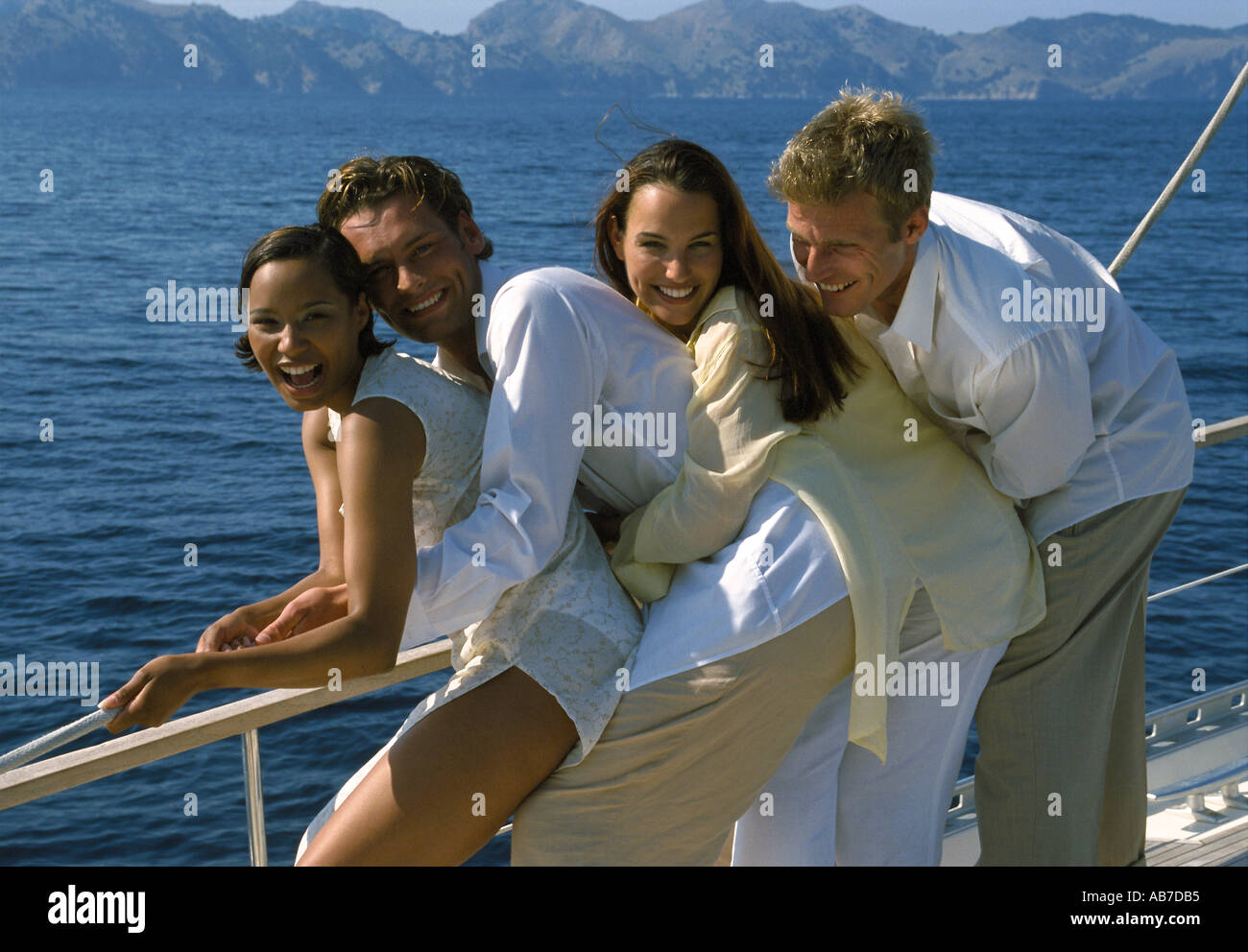 Woman small sailboat yacht hi-res stock photography and images - Alamy