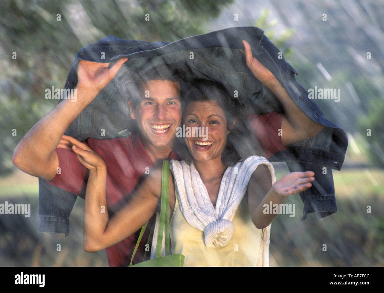 Laughing in rain hi-res stock photography and images - Alamy