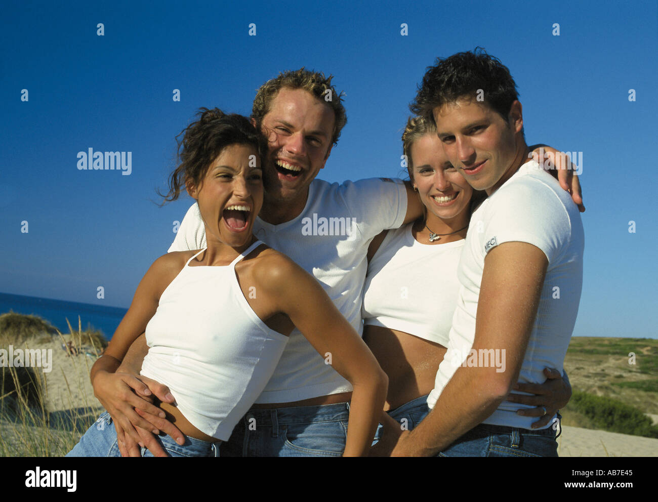 Group of four peop hi-res stock photography and images - Alamy