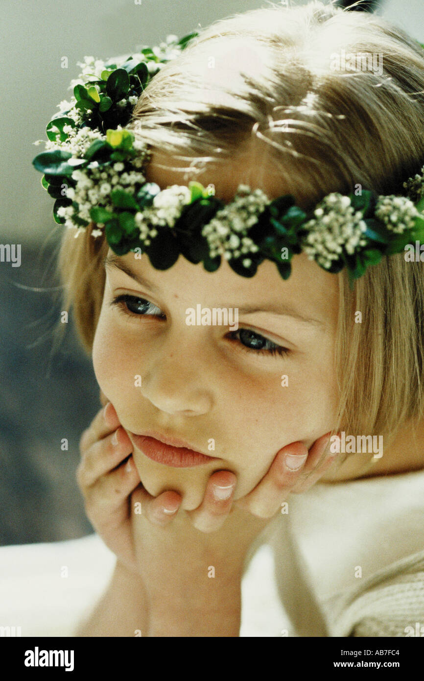 Girl with flower coronet Stock Photo - Alamy