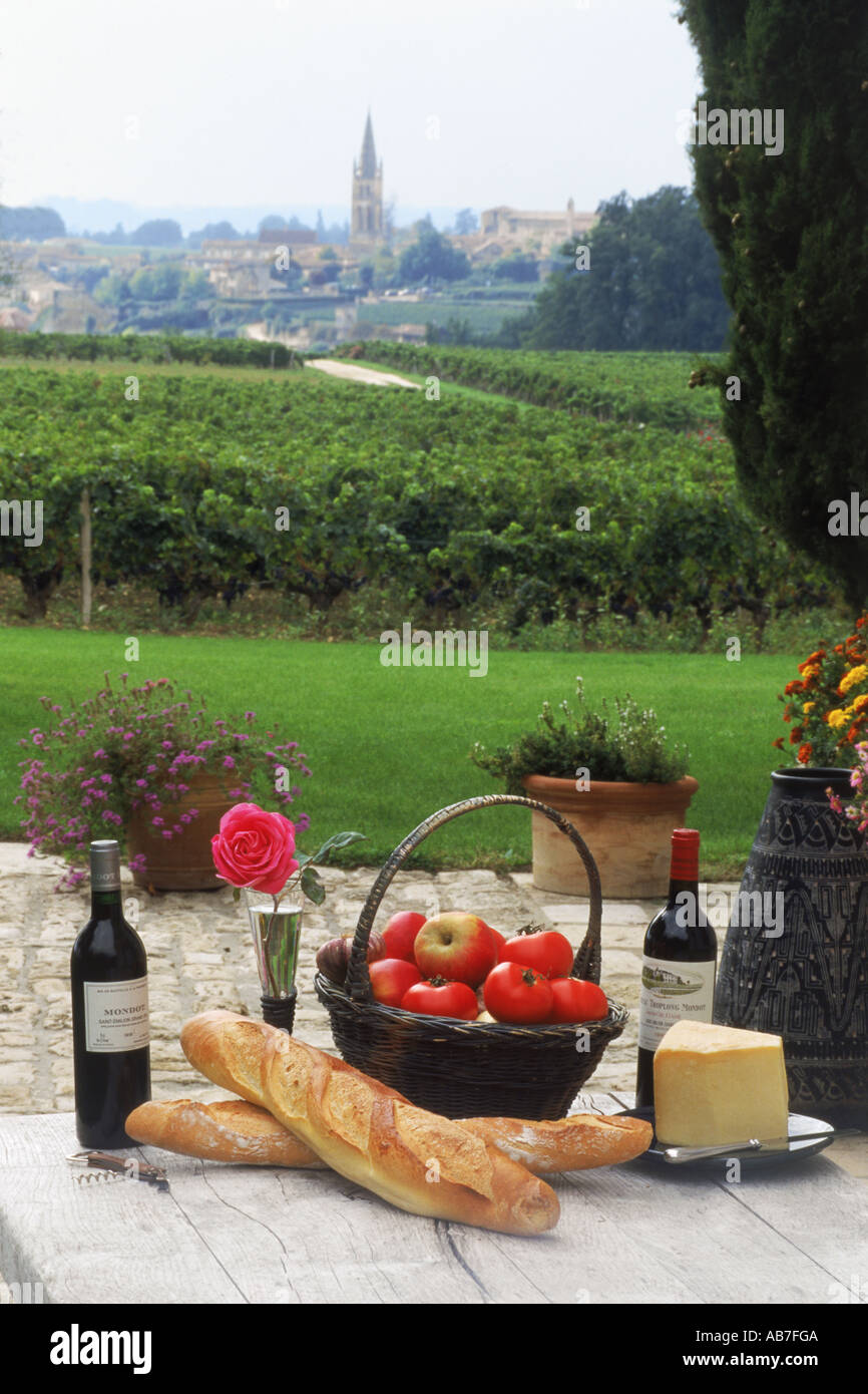 French wine, bread and cheese with vineyards of Saint Emilion and ...