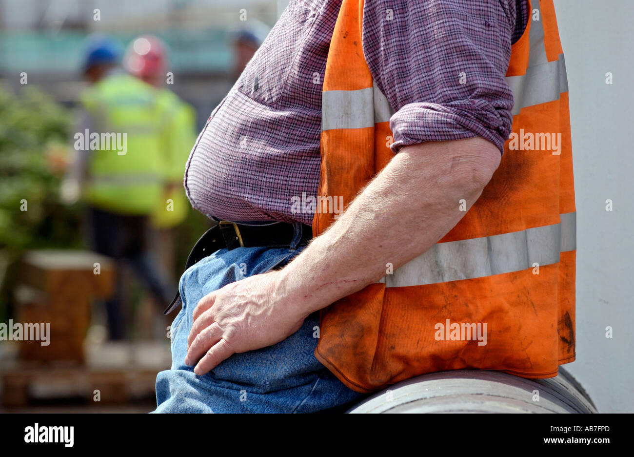 Overweight construction worker Wales UK Stock Photo - Alamy