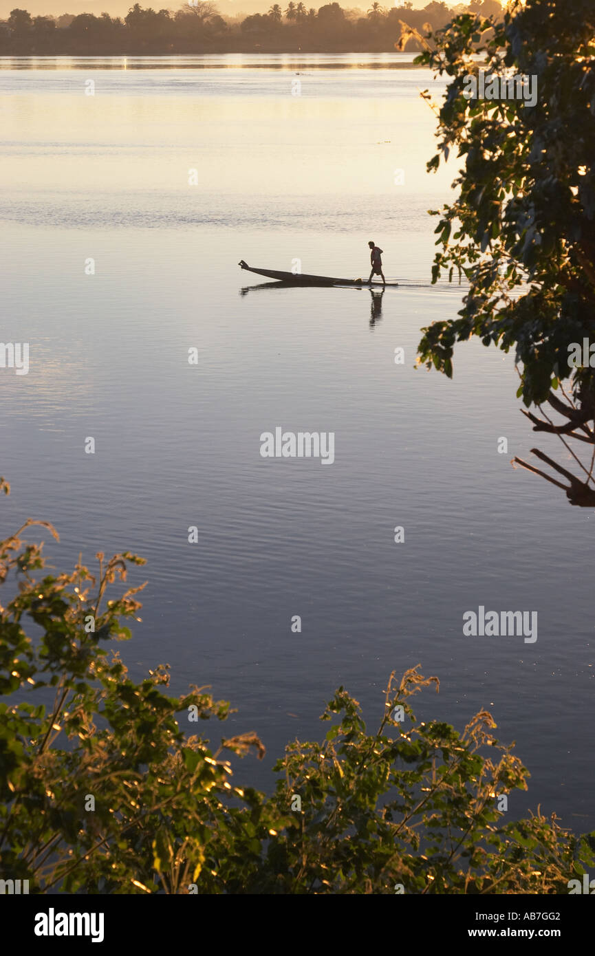 Man Paddling Boat On Mekong River Stock Photo - Alamy