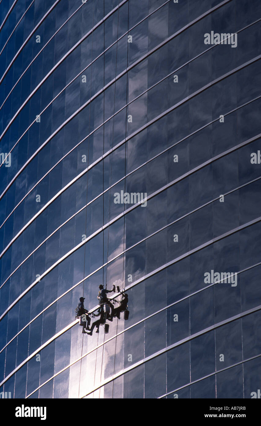 Two men cleaning windows on high rise building, Phoenix, Arizona, USA ...