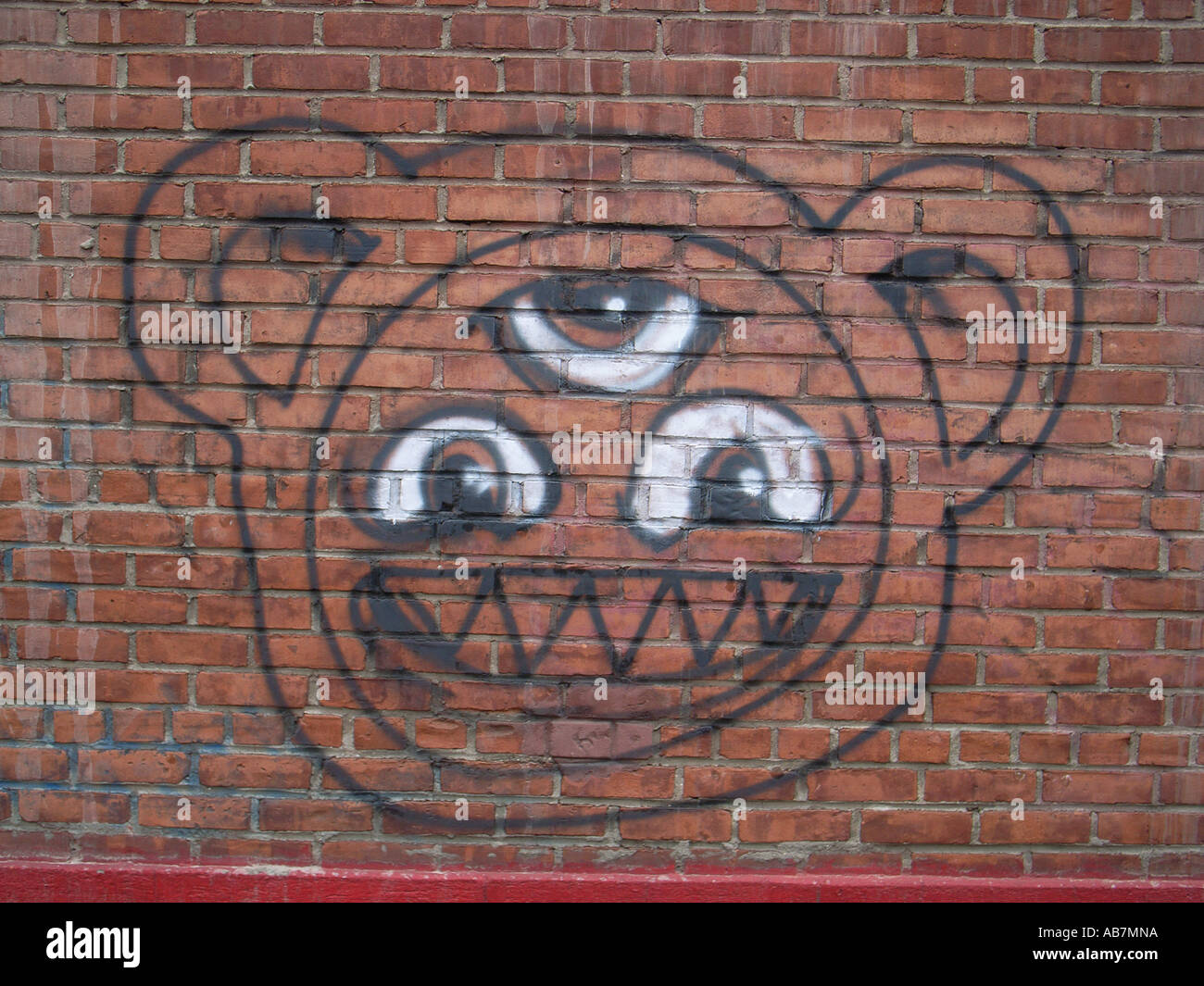 Strange graffiti on a brick wall, NewYork City Stock Photo - Alamy
