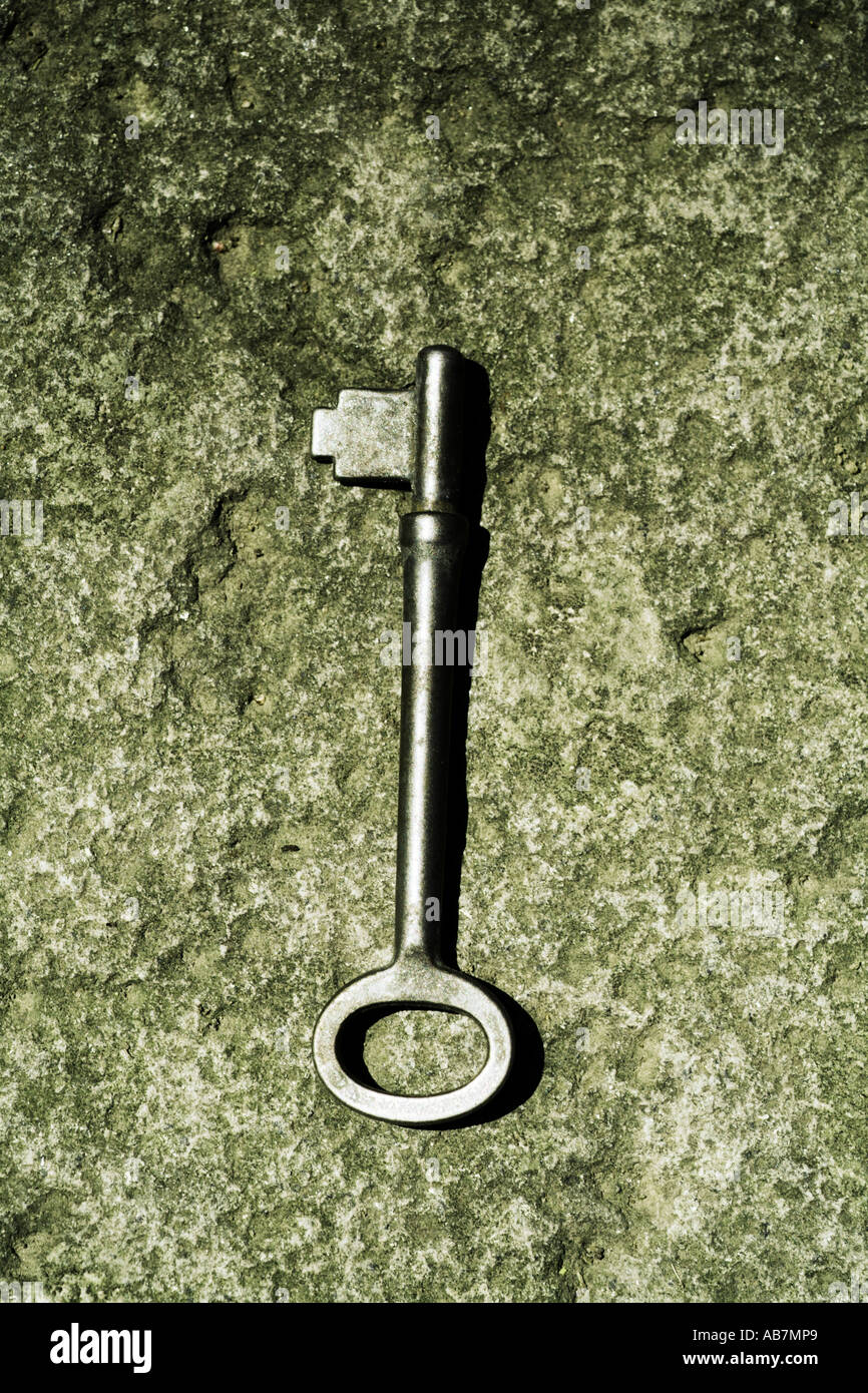 Old Key on stone surface Stock Photo - Alamy