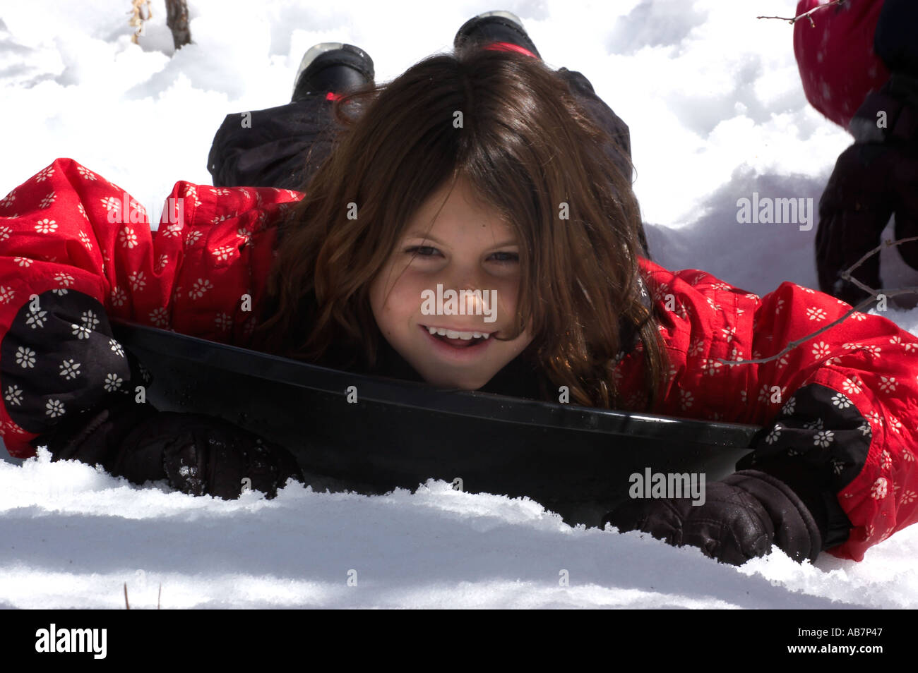 snow girl on sled Stock Photo - Alamy