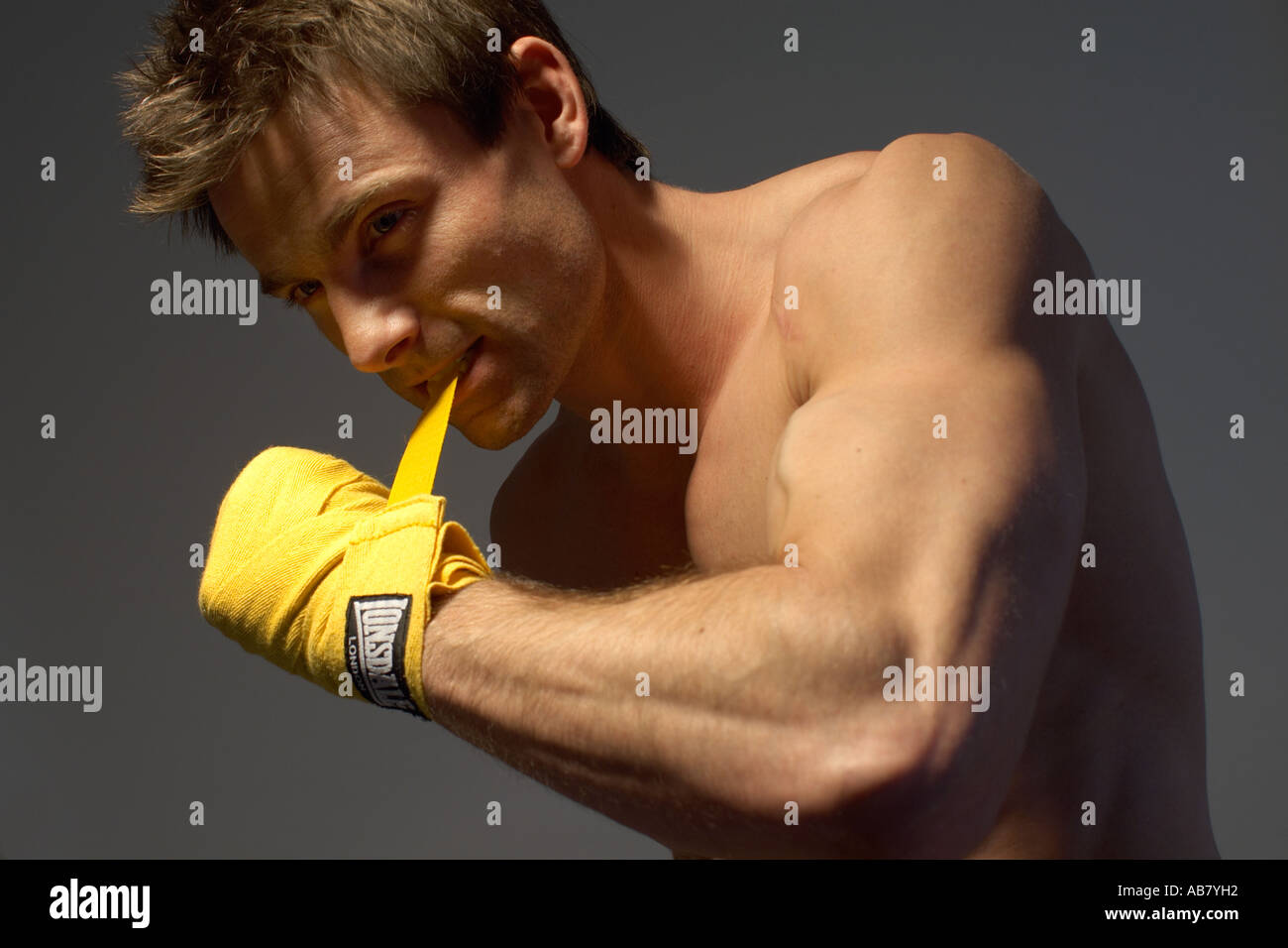 boxer preparing for a fight taping his hands Stock Photo - Alamy