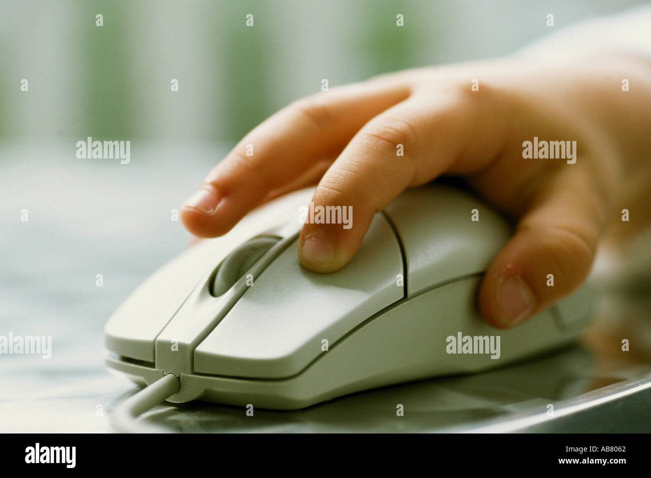 Child operating mouse Stock Photo - Alamy