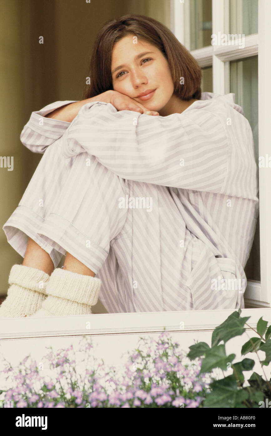 Girl at window Stock Photo - Alamy