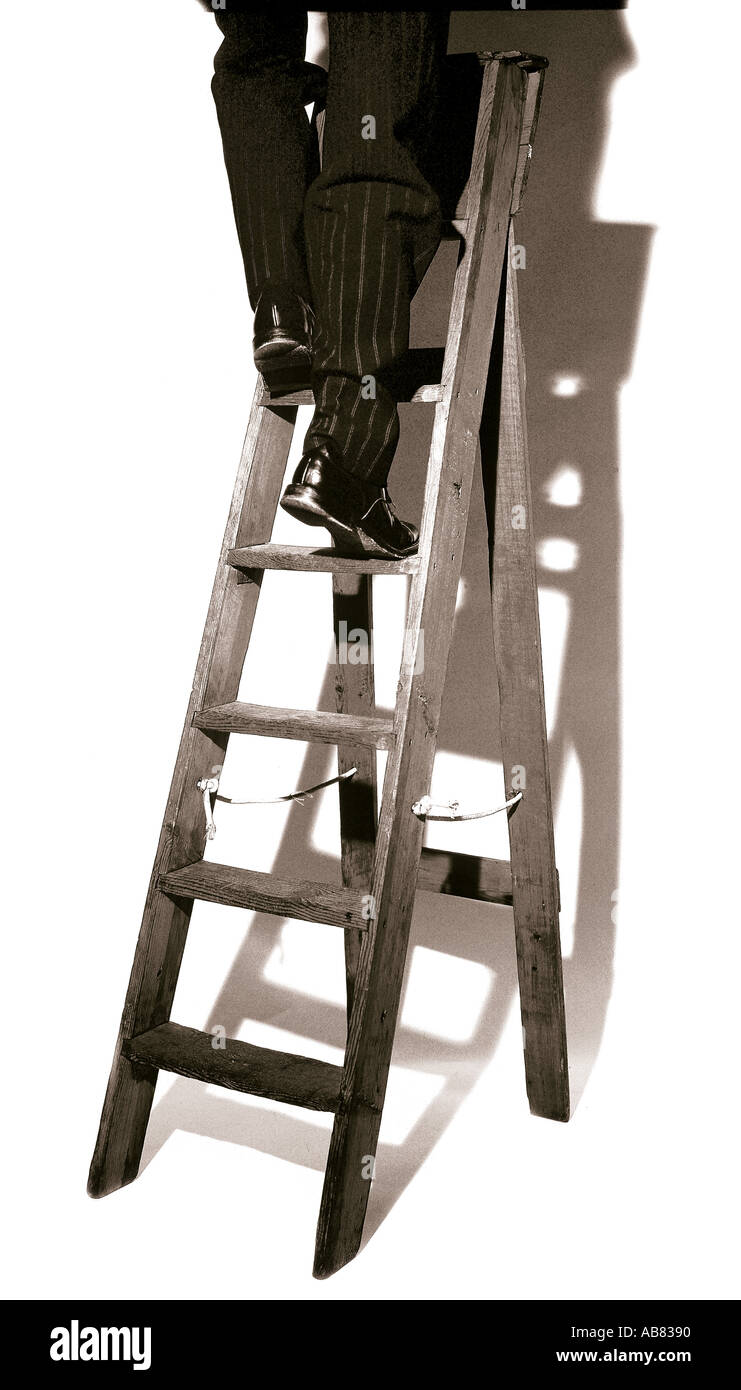 Climbing the ladder Stock Photo - Alamy