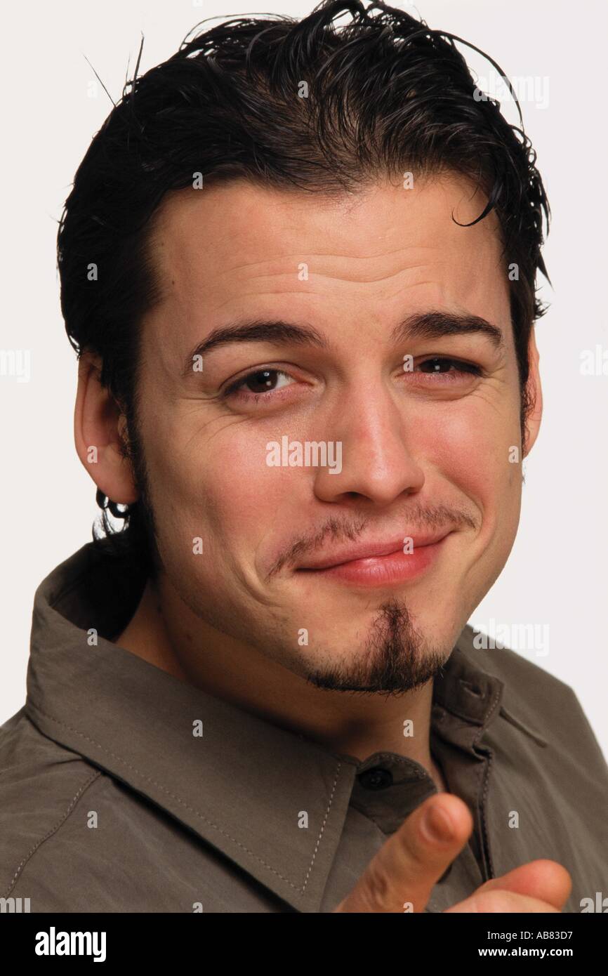 Smirking man hi-res stock photography and images - Alamy