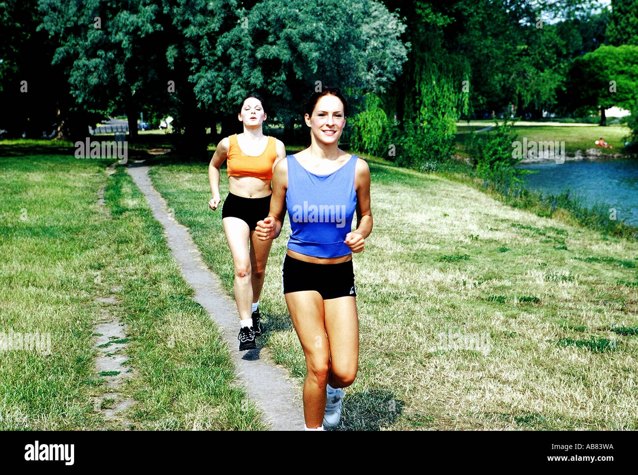 Women jogging outside hi-res stock photography and images - Alamy