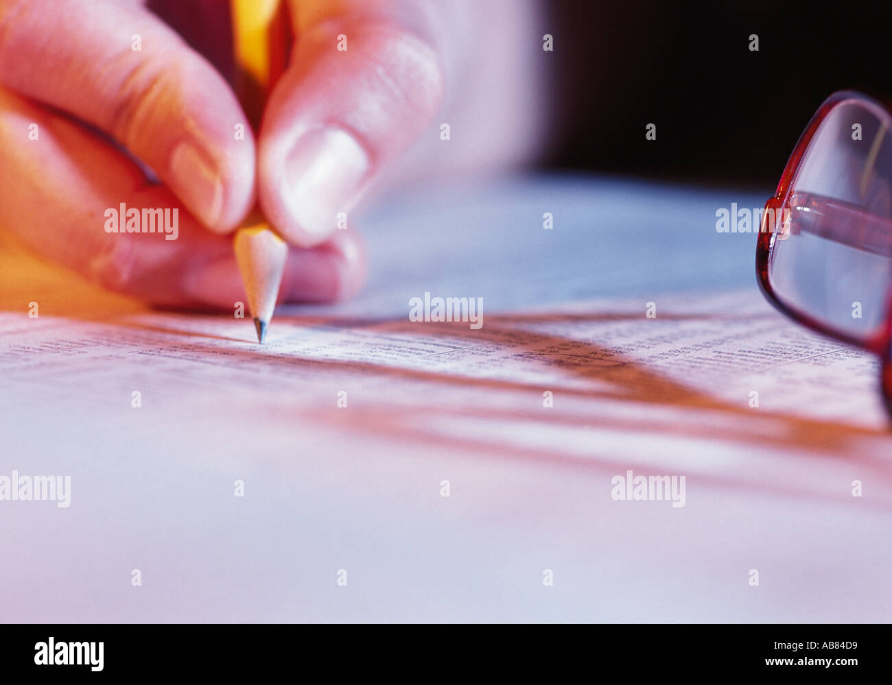 Adult hand holding a pencil hi-res stock photography and images - Alamy