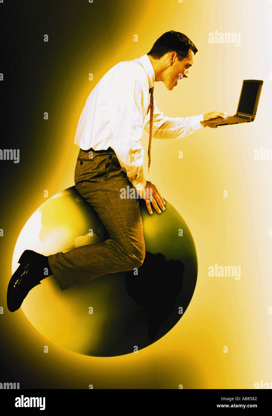 Man on globe Stock Photo - Alamy