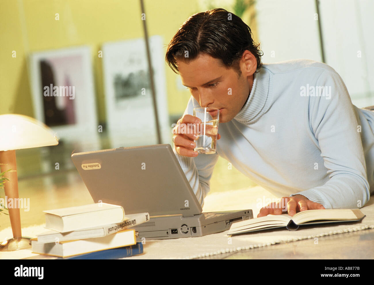 Man at computer Stock Photo - Alamy