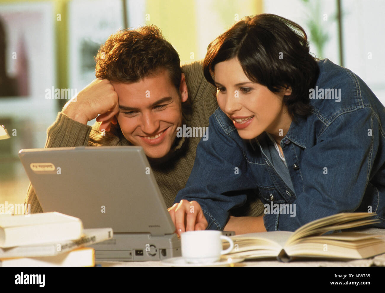 Couple at computer Stock Photo - Alamy