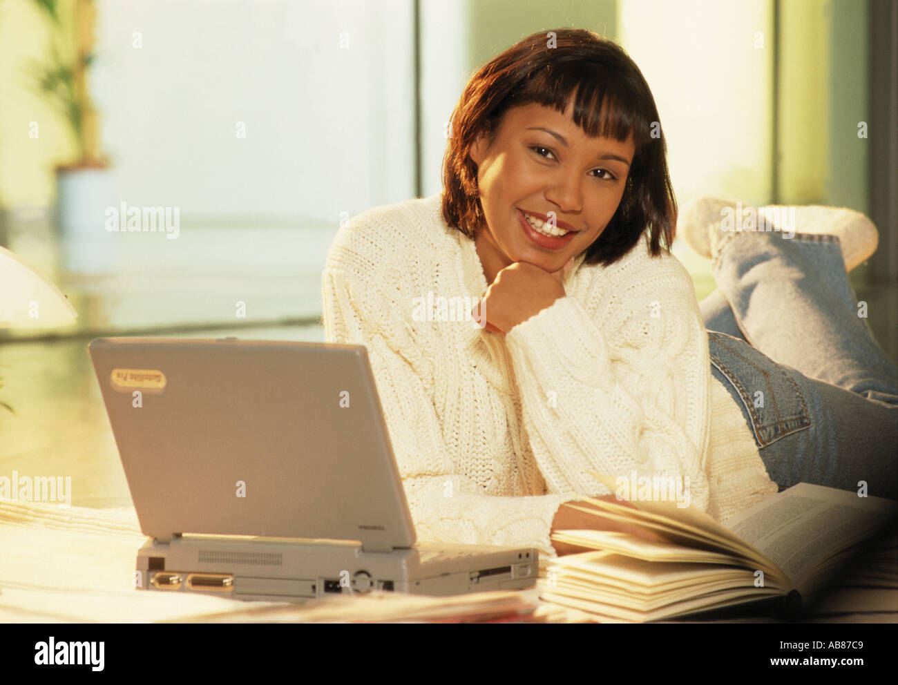 Woman with computer Stock Photo - Alamy