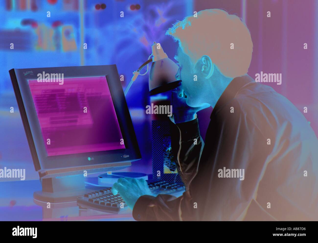 Man at computer Stock Photo - Alamy