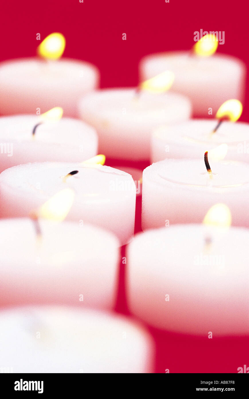 Candle candles light illuminated alight hi-res stock photography and ...
