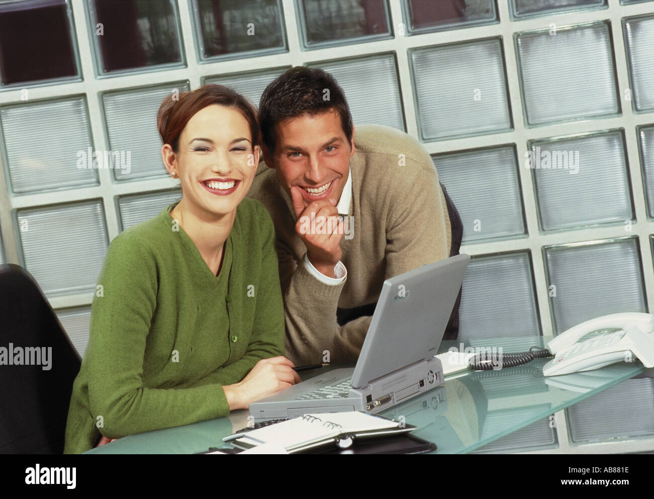 Smiling office workers Stock Photo - Alamy