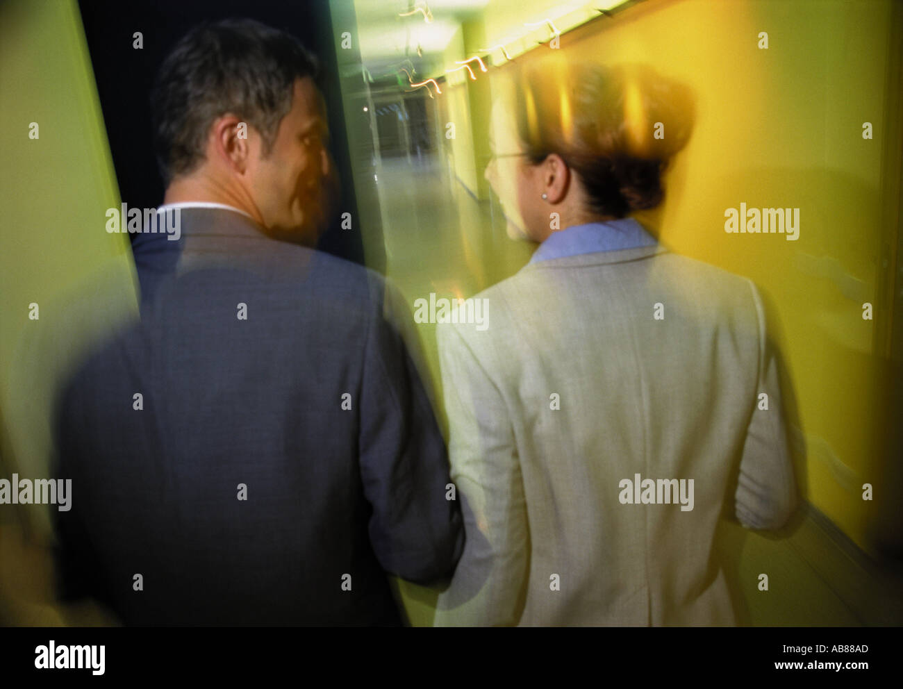 Business couple talking Stock Photo - Alamy