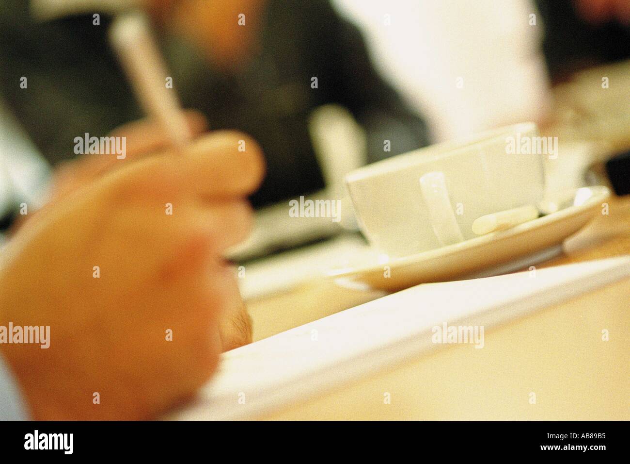 Person taking notes Stock Photo - Alamy