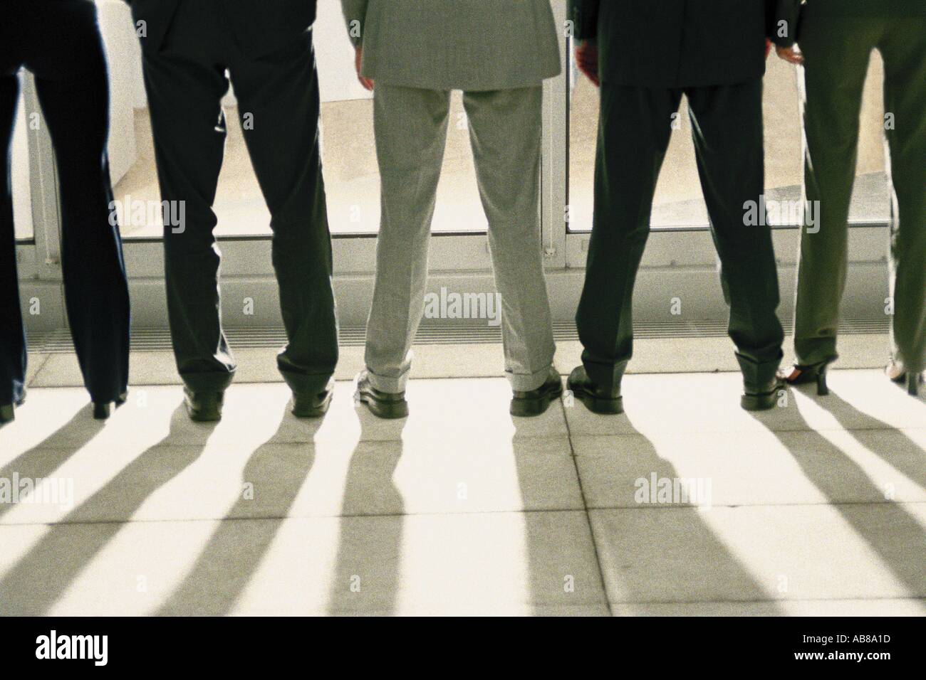 Business people standing Stock Photo - Alamy