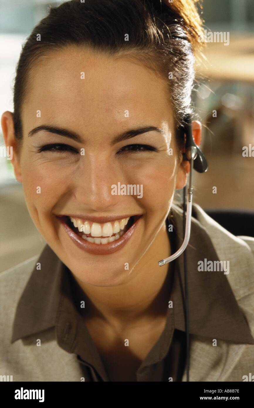 Woman with headset Stock Photo - Alamy