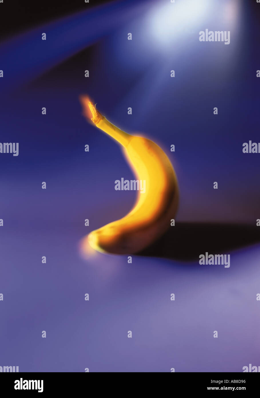 Banana on a blue background Stock Photo - Alamy