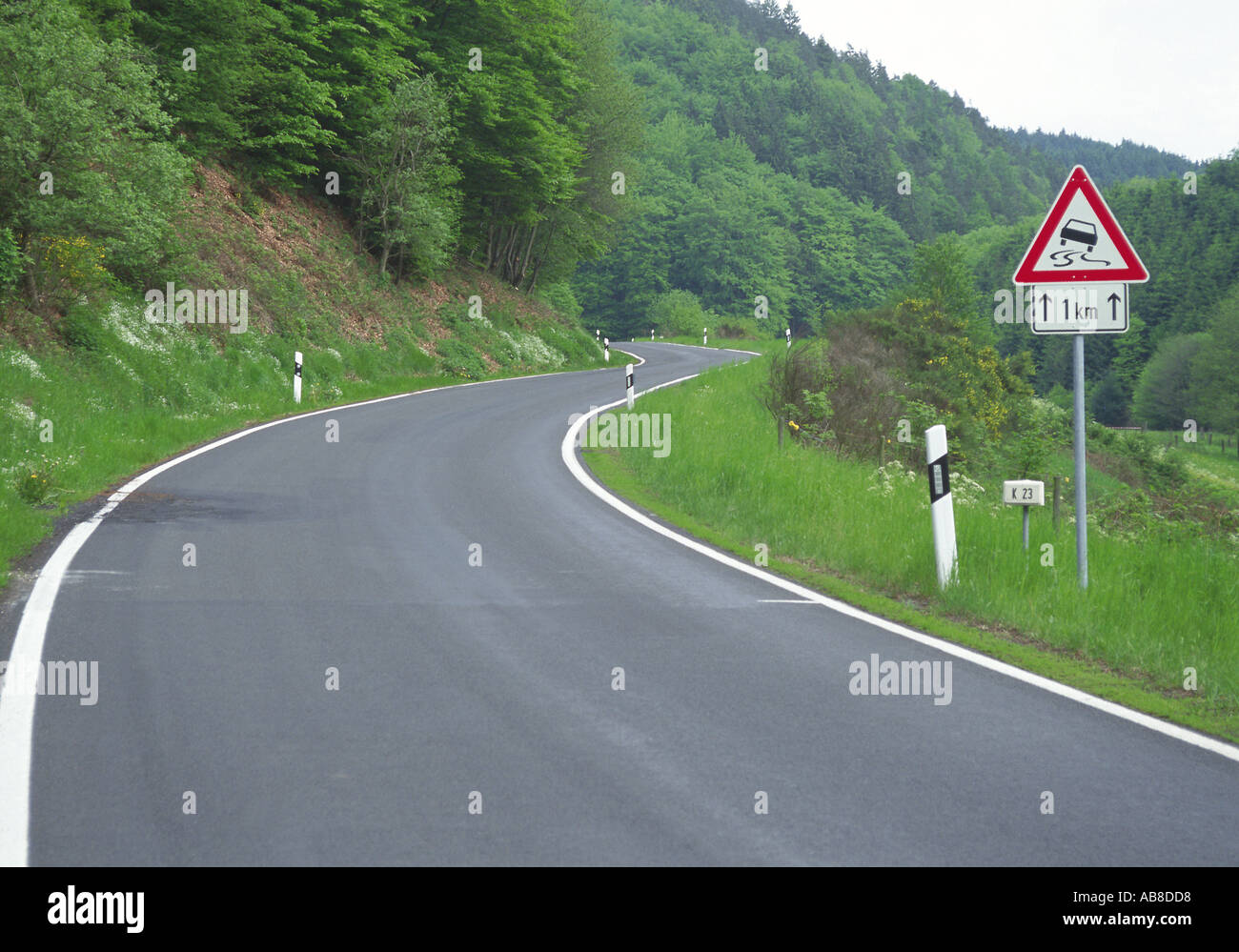 Curving country road Stock Photo - Alamy
