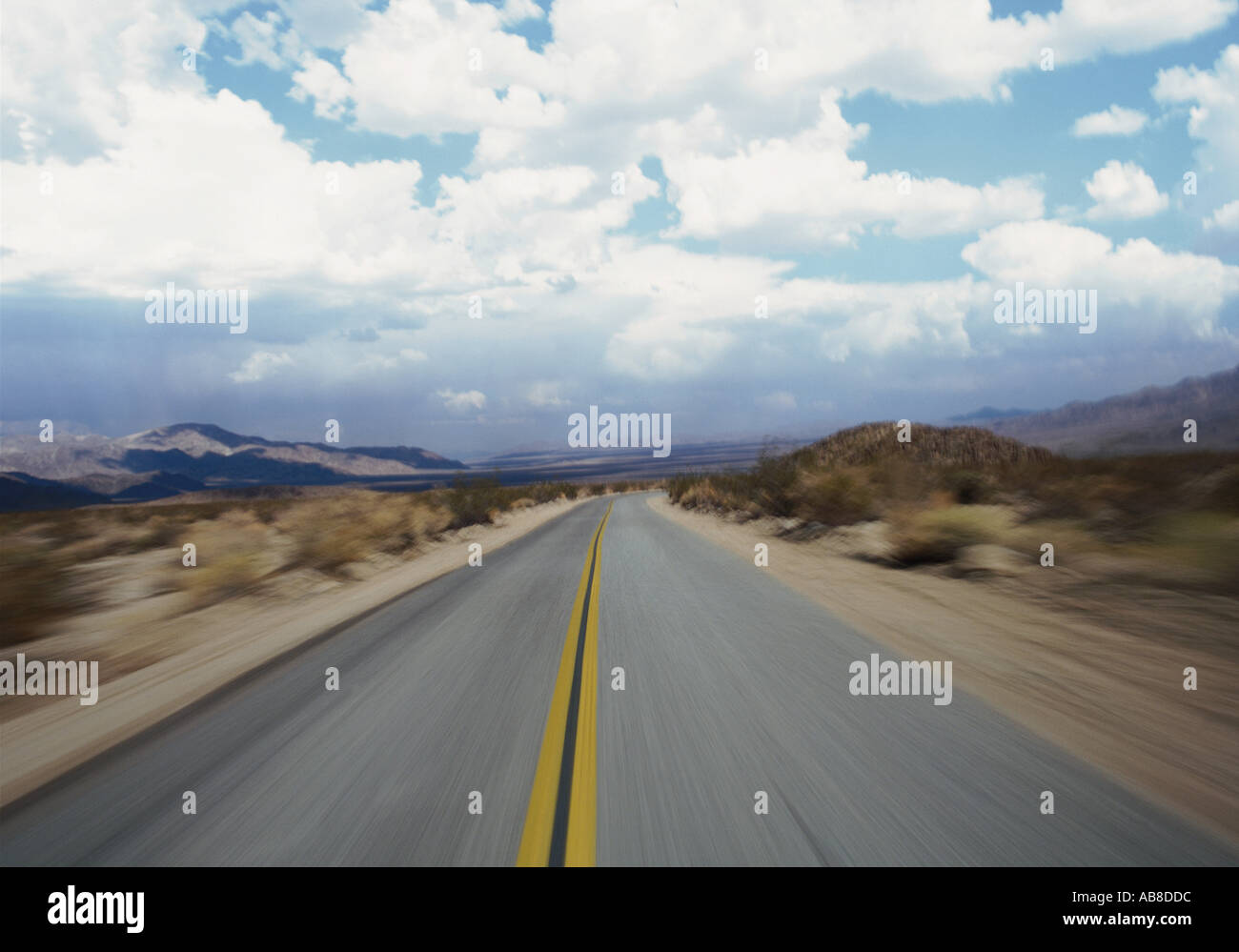 Blurred desert road Stock Photo - Alamy
