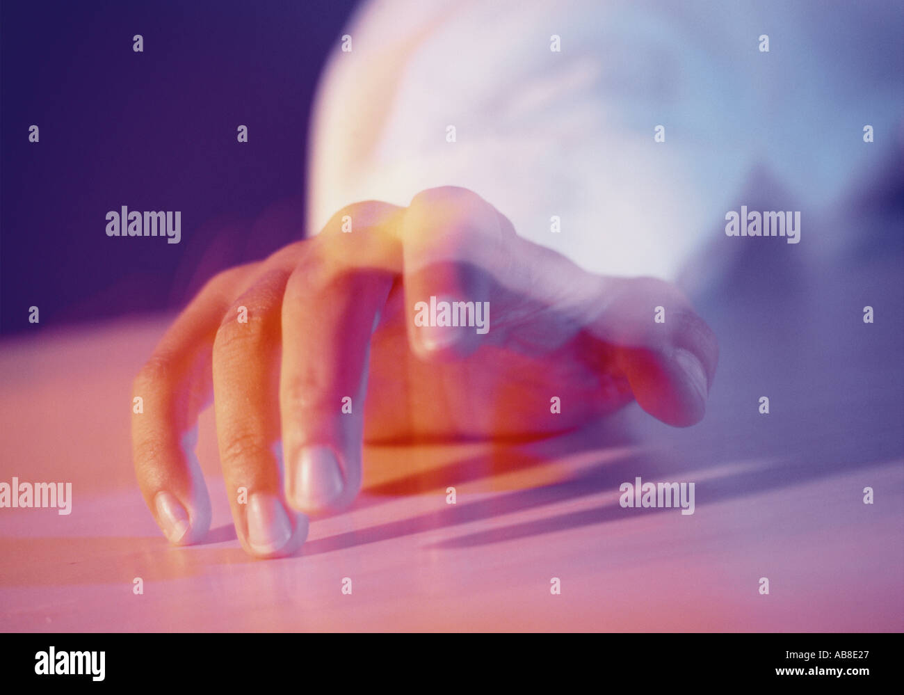 Hand on table Stock Photo - Alamy