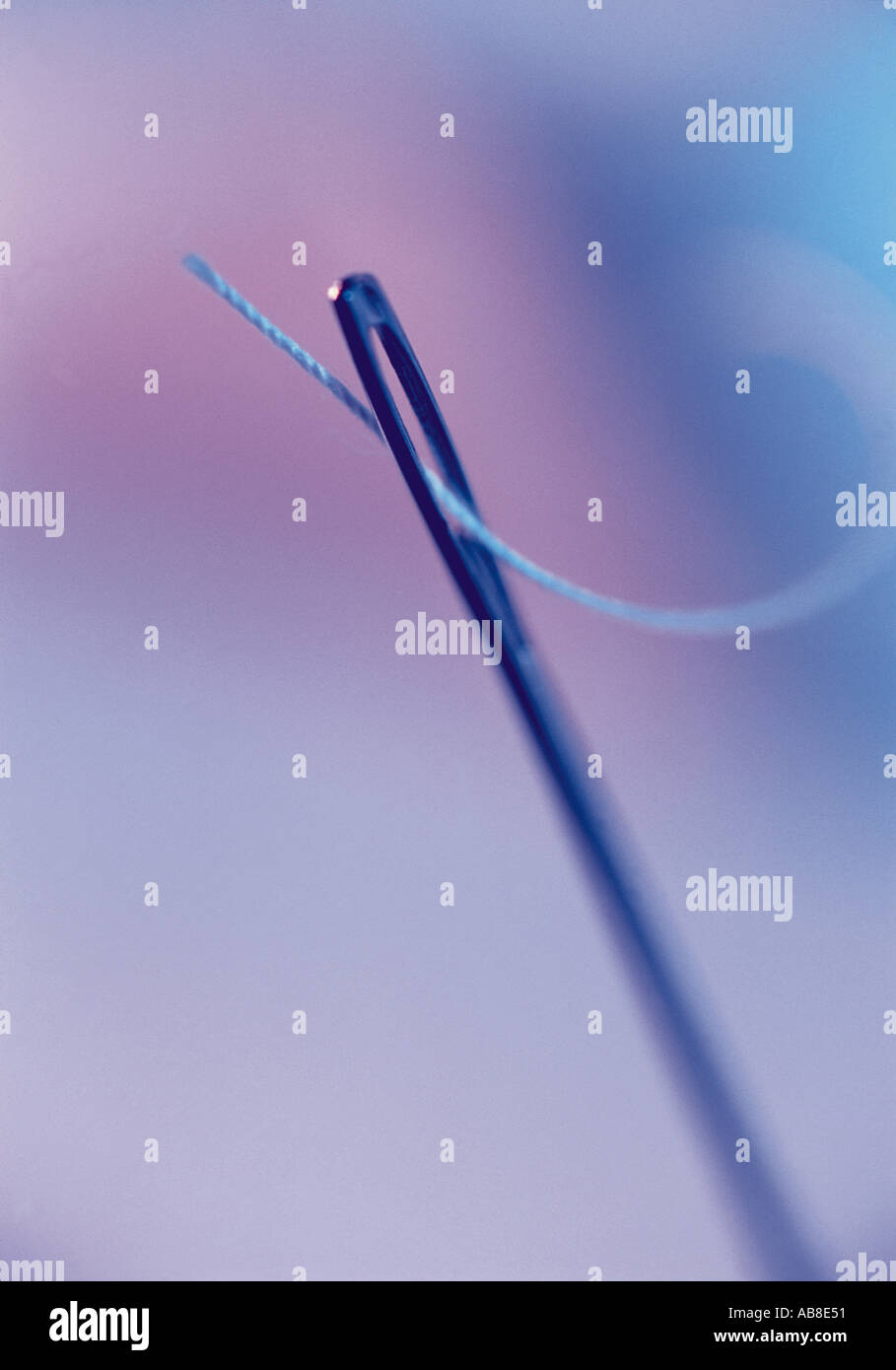 Needle and thread Stock Photo - Alamy