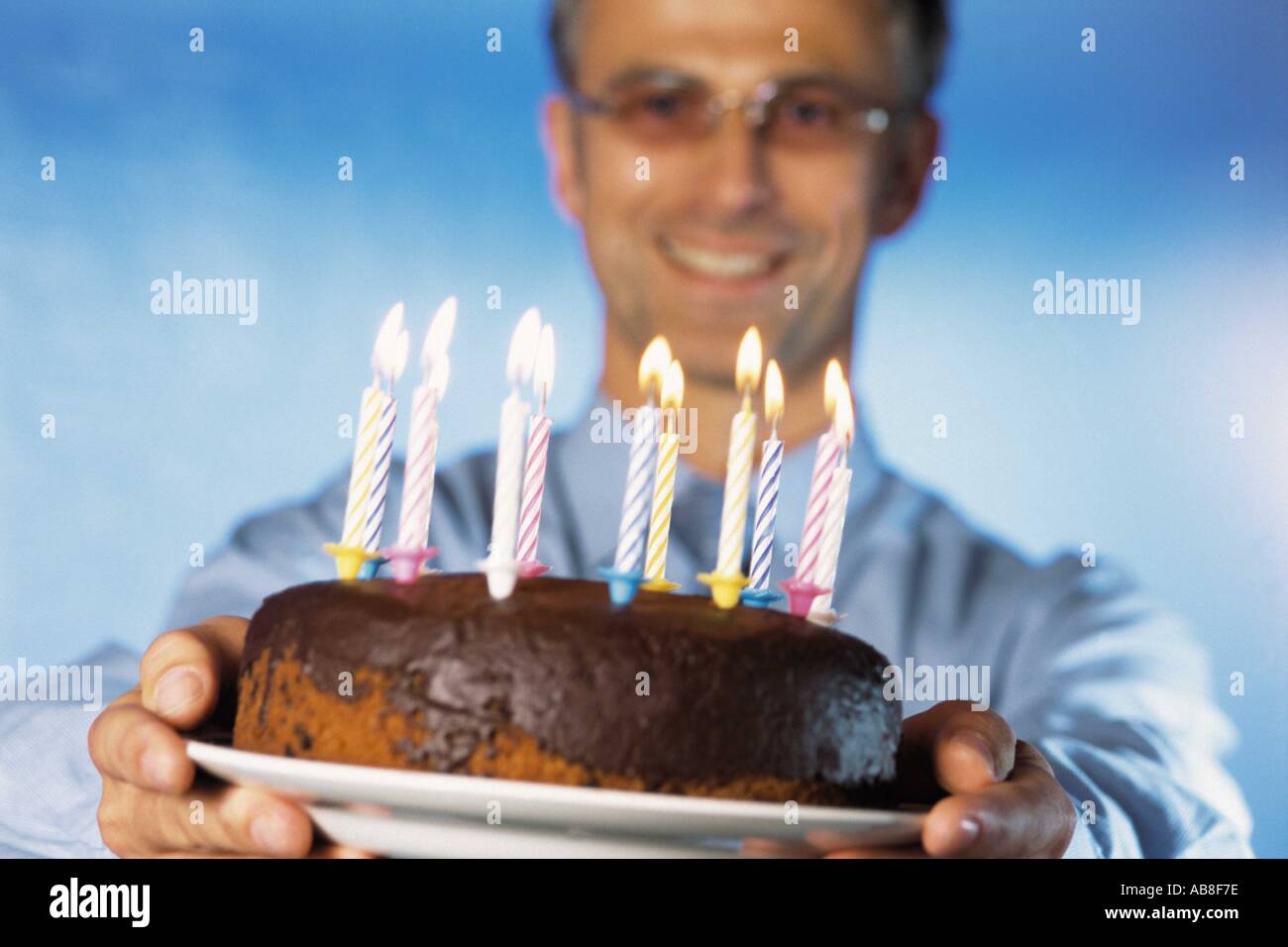 Man men carrying cake hi-res stock photography and images - Alamy