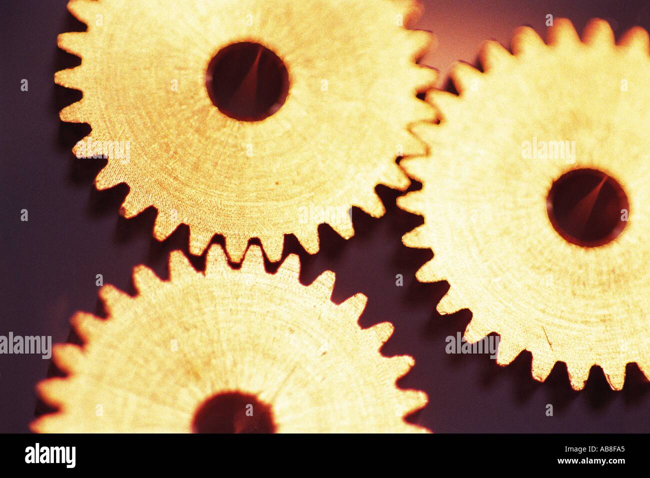 Golden cogwheels hi-res stock photography and images - Alamy