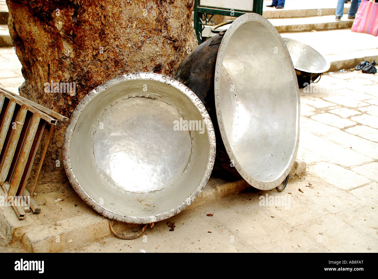 Copper pans at Place Seraffin Medina of Fez Morocco Stock Photo - Alamy