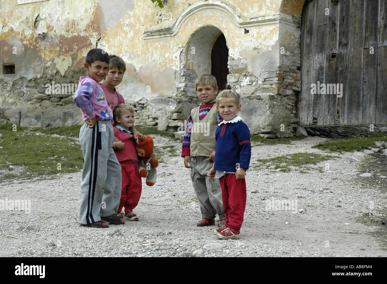 children on village street, Romania Stock Photo - Alamy