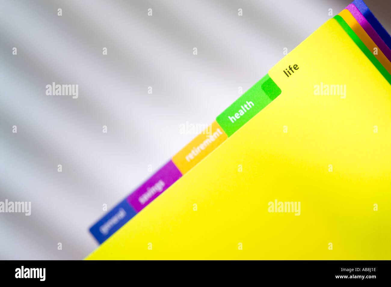 Brightly coloured plastic subject divider tabs labelled 'general ...