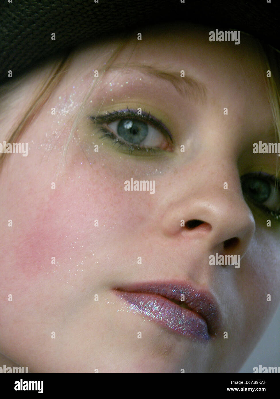 Questioning Look on Young Woman's Face Stock Photo - Alamy