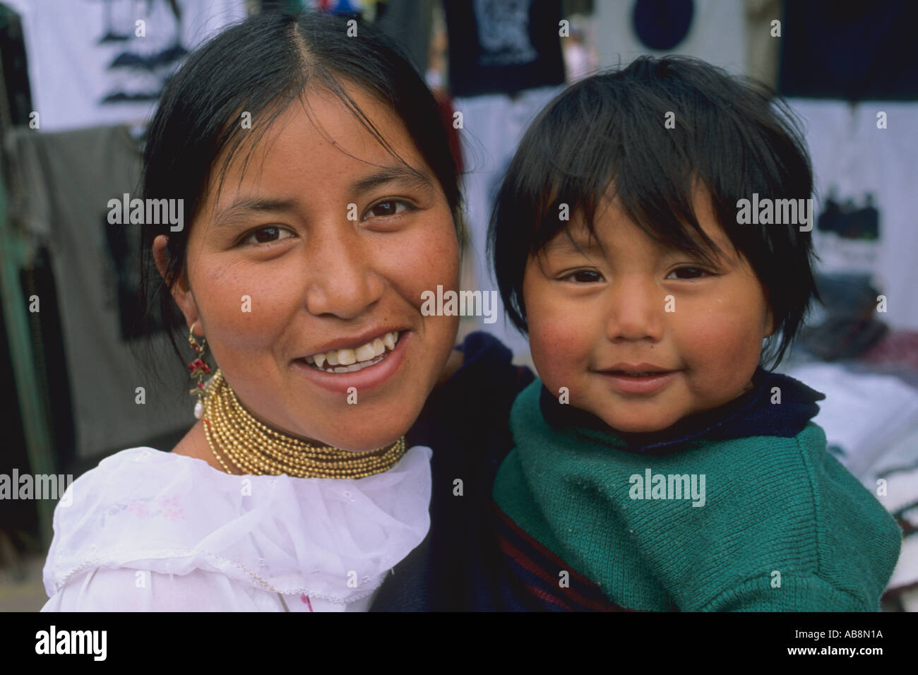 Ecuador Otavalo market woman and child Stock Photo - Alamy
