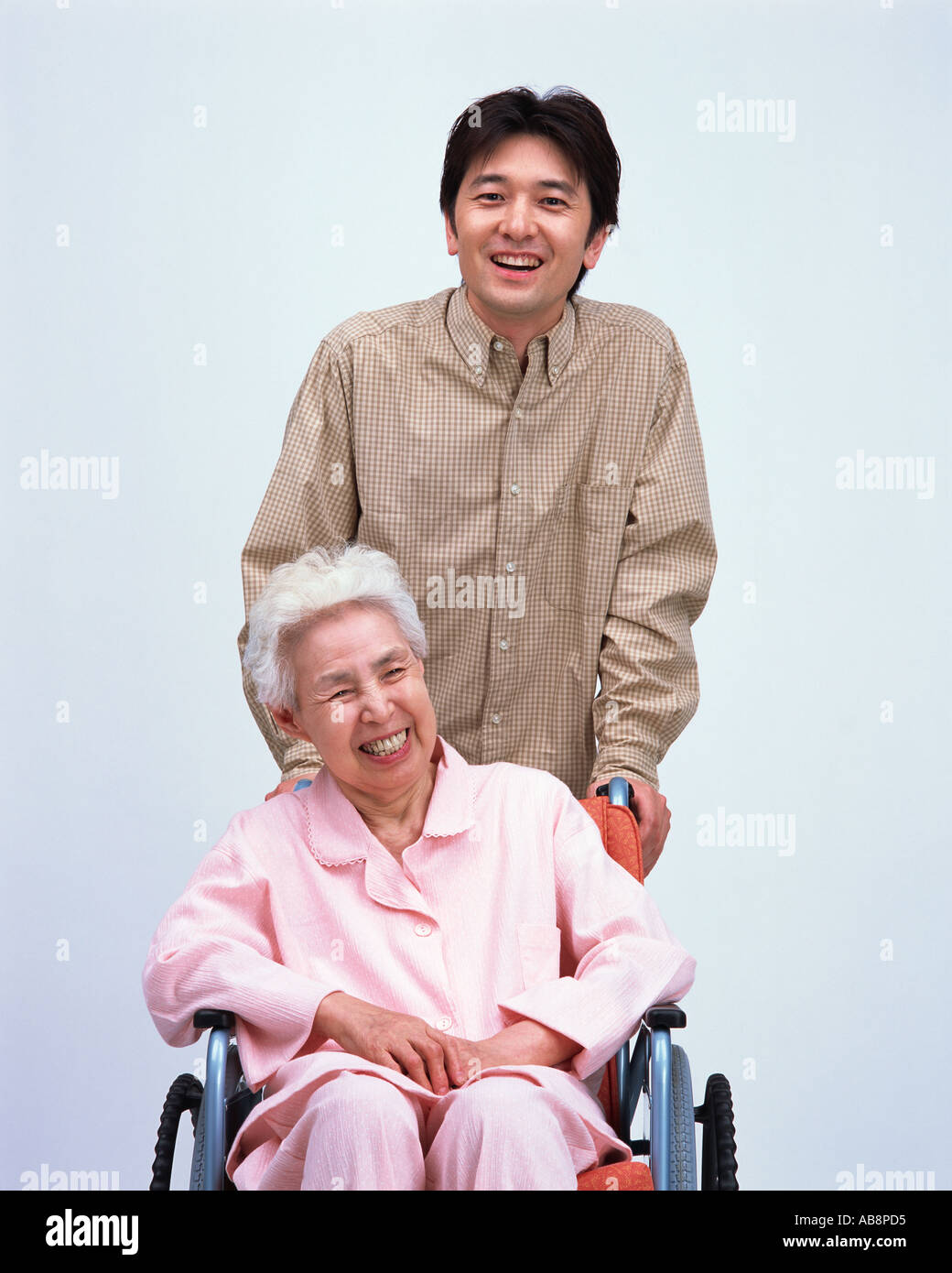 Elderly mother and son at hospital hi-res stock photography and images ...