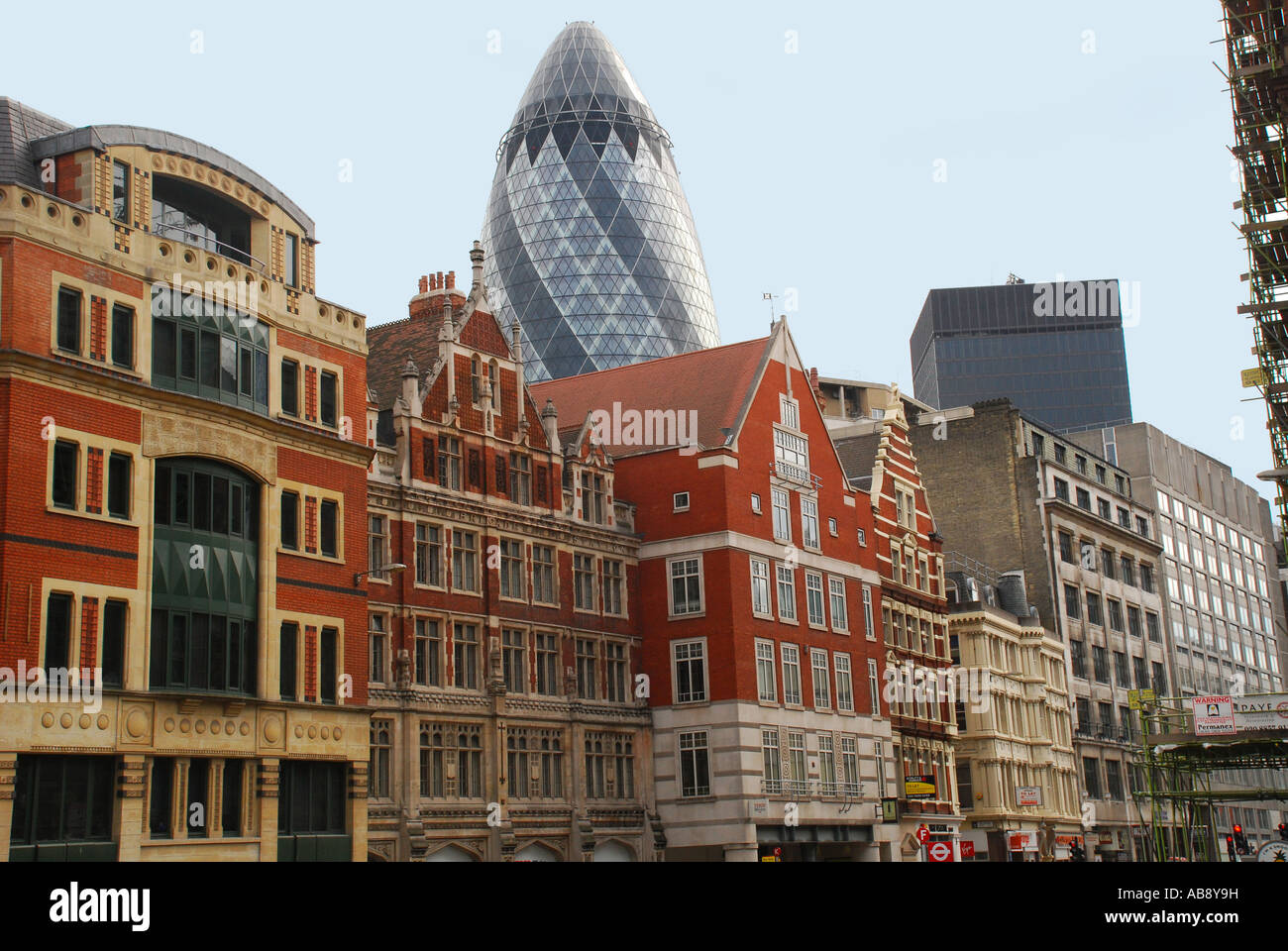 Houses near Liverpool station with silhouette Swiss-Re Tower "Gherkin ...