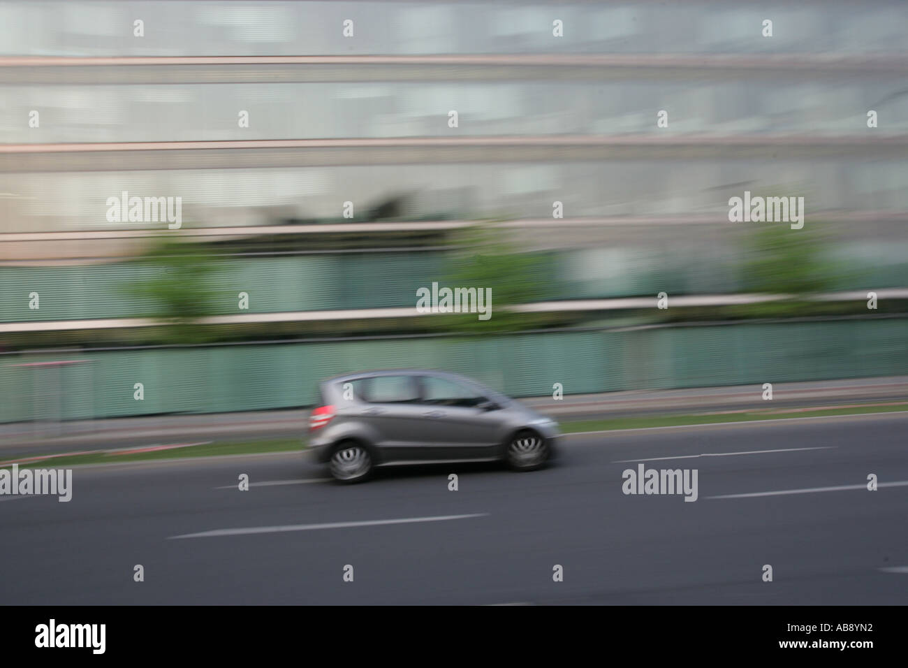 Car driving past hi-res stock photography and images - Alamy