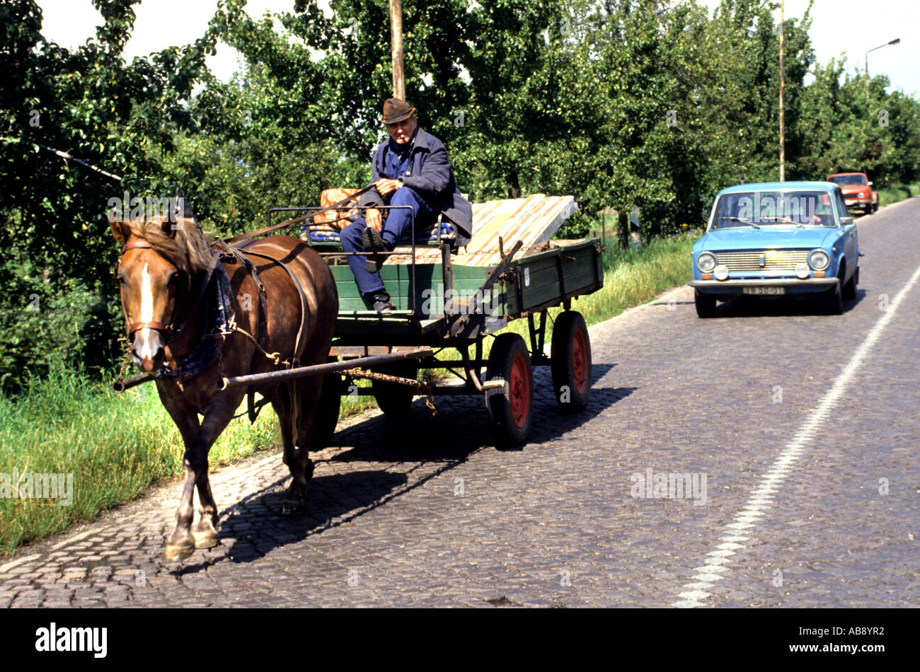 East 1985 germany Farmers man woman Horsecart Stock Photo - Alamy