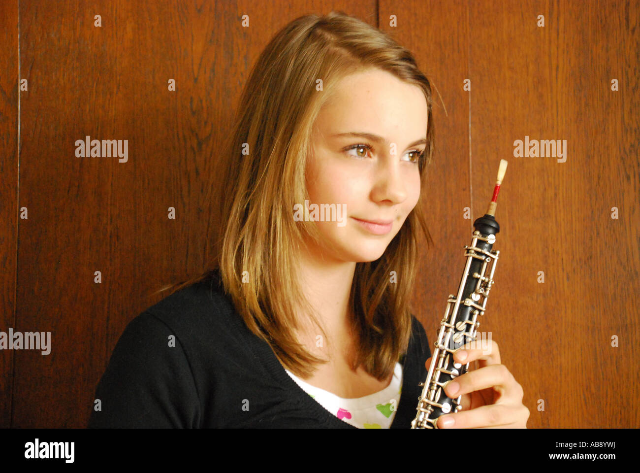 Child playing oboe, Mädchen mit Oboe Stock Photo - Alamy