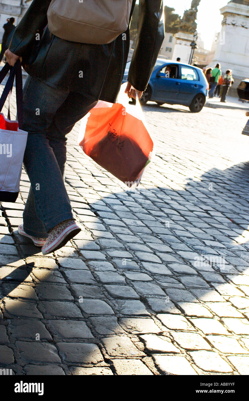 man walking with shopping Stock Photo - Alamy