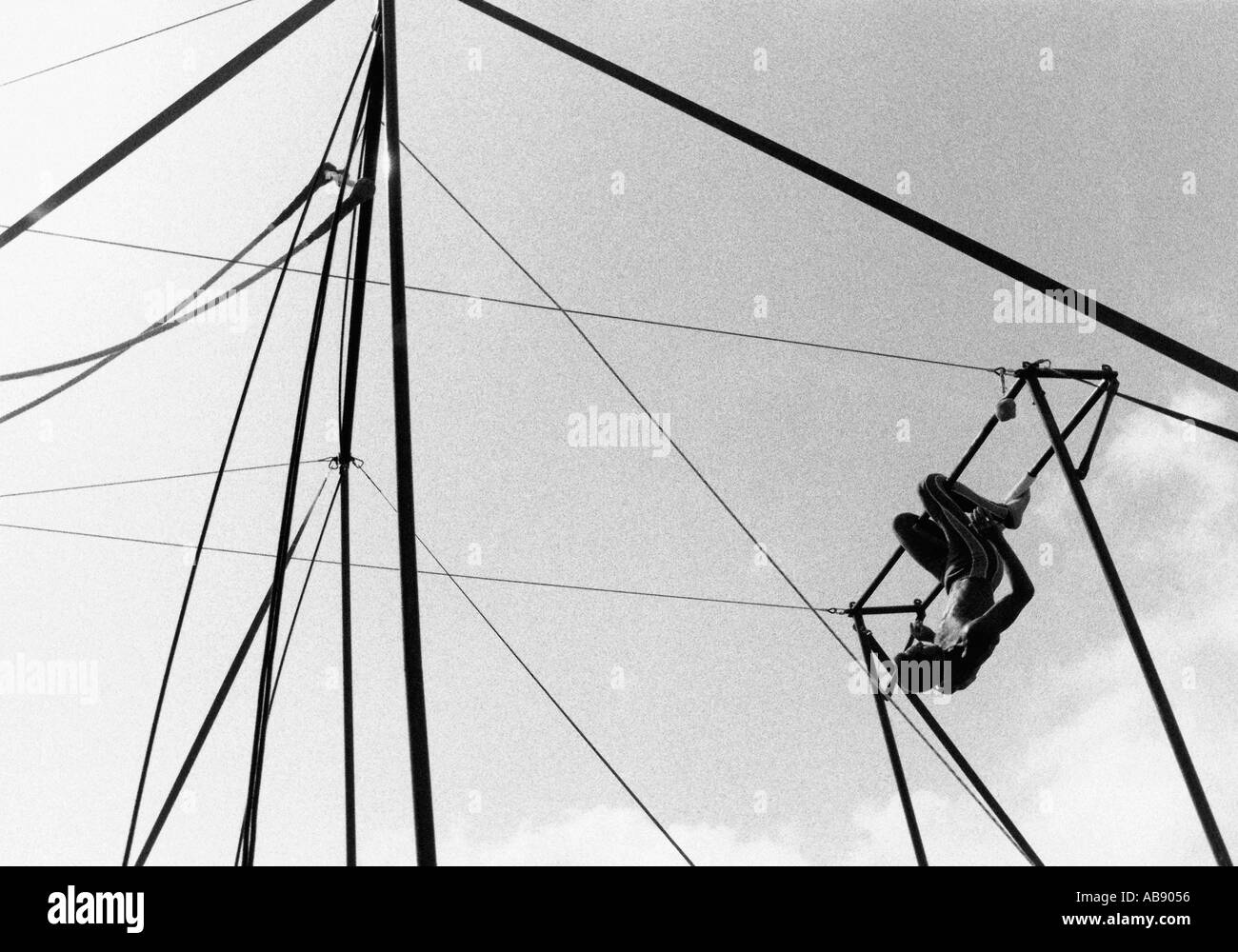 Trapeze and high wire performers Black and White Stock Photos & Images ...